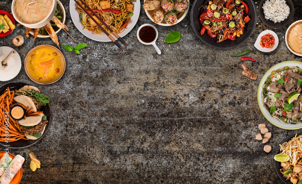 Asian food background with various ingredients on rustic stone ...