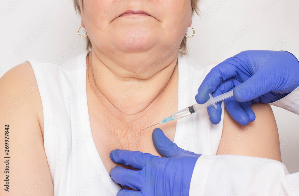 Doctor injects mesotherapy and biorevitalization of an elderly woman to ...