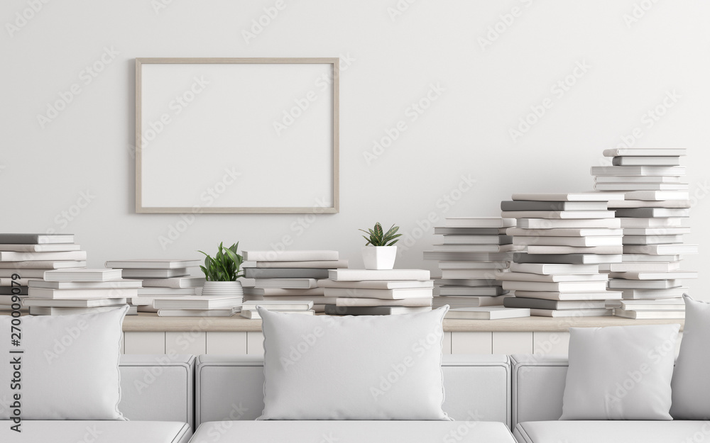 Closeup of stack of books and picture frame on white wall background ...