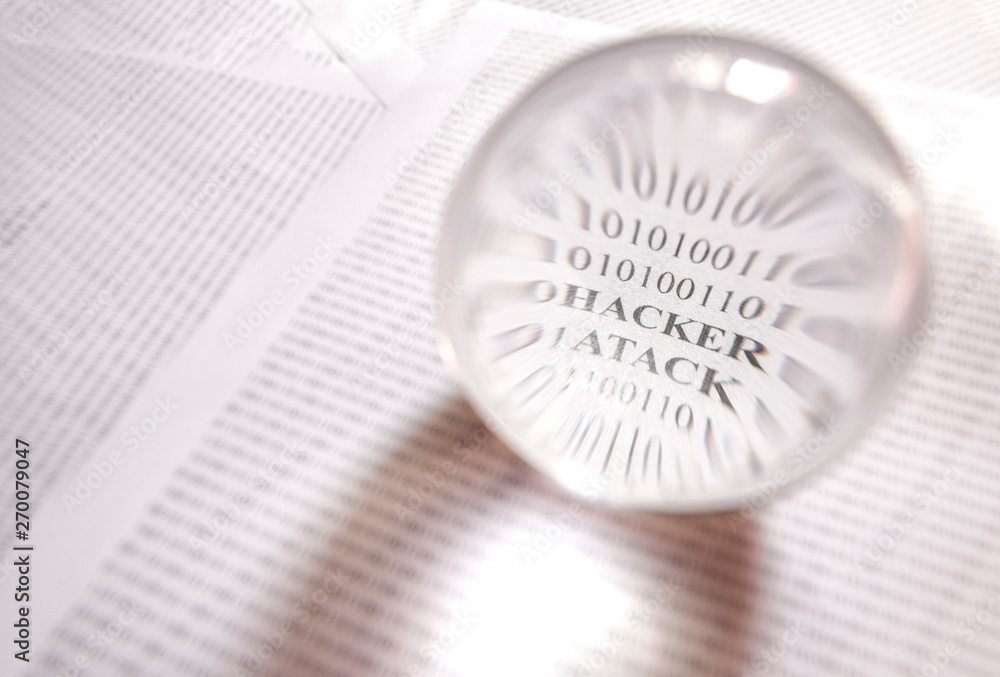 Hacker atack message revealed by an magnifying glass, by an lensball ...