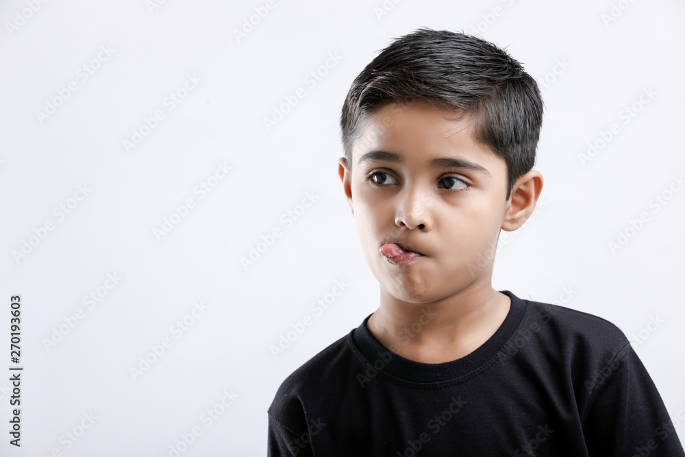 Cute Indian little boy giving multiple expression Stock Photo | Adobe Stock