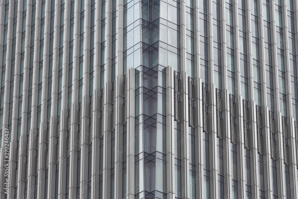 Silver and blue modern building tempered glass structure vertical line ...