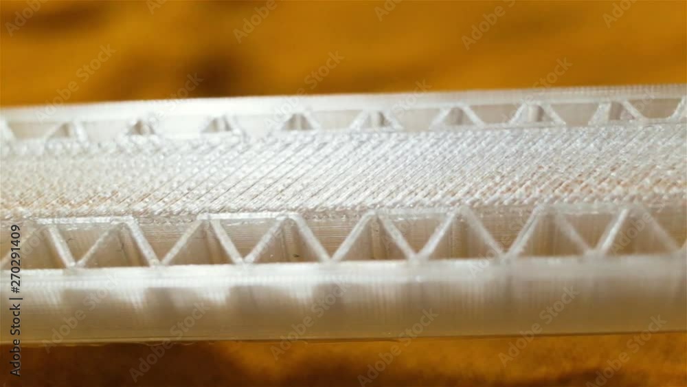 3D printed model close-up. Transparent plastic, mesh. Real time ...