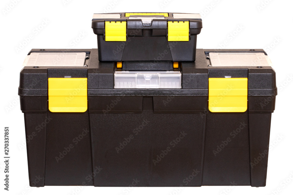 Tool boxes isolated. Closeup of a big black plastic tool kit box with ...