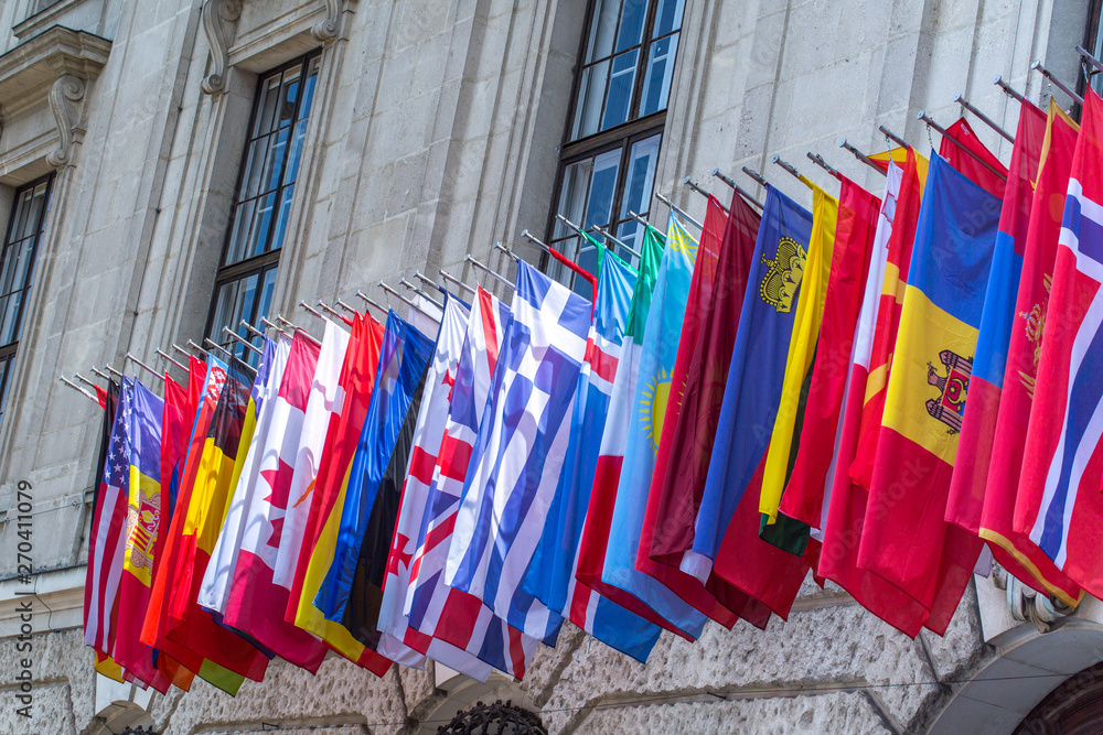 Flags of almost all countries of the northern hemisphere on the facade ...