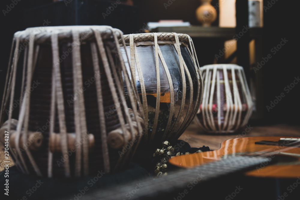 Acoustic guitar, cajon and tabla - view of the musical instruments used ...