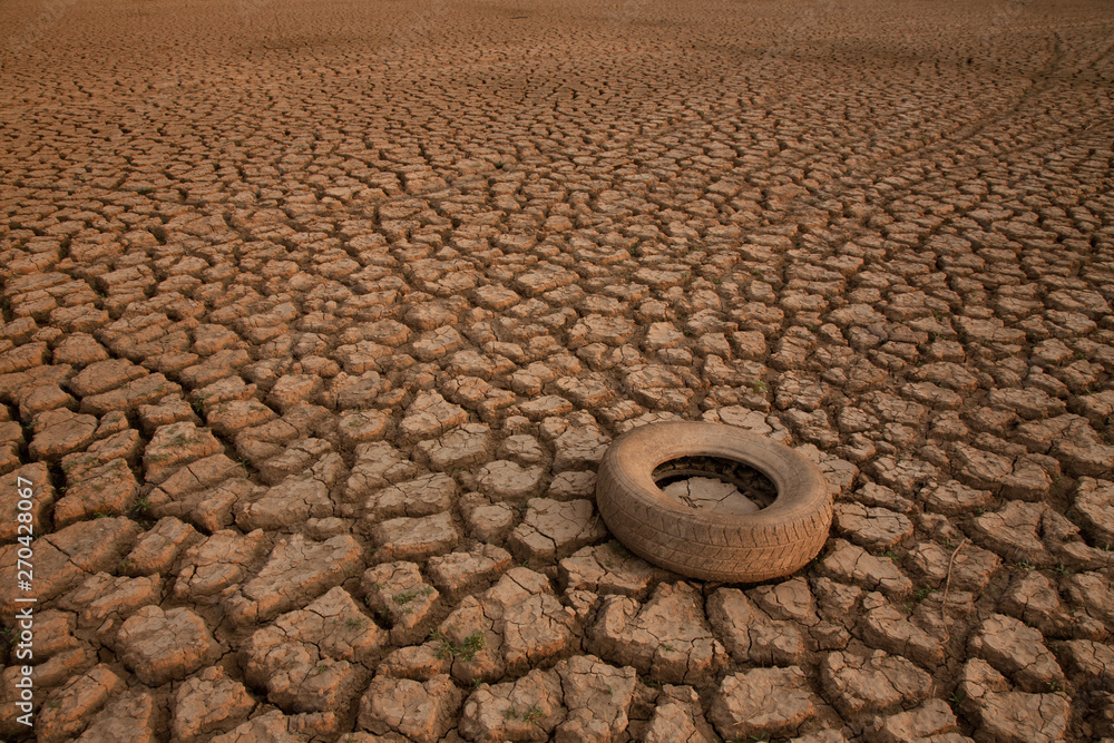 Gabbage from industrial on cracked earth metaphor Environment pollution ...