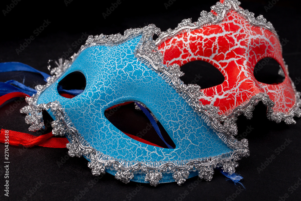 masquerade masks red and blue on a black background Stock Photo | Adobe ...