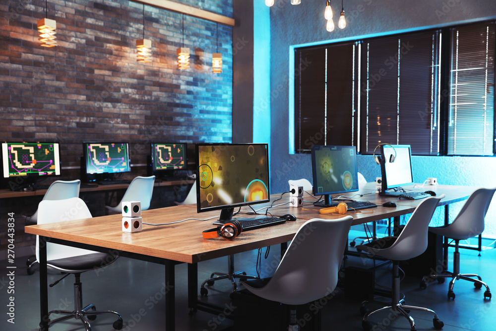 Internet cafe interior with modern computers. Video game tournament ...