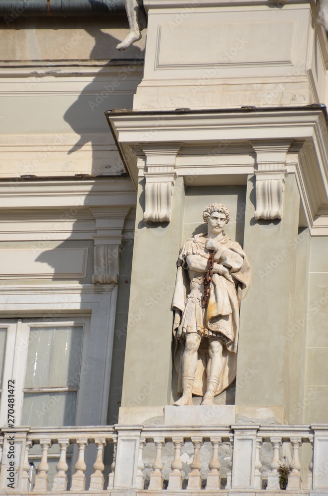 architectural detail of a baroque church window and pilasters sculpture ...