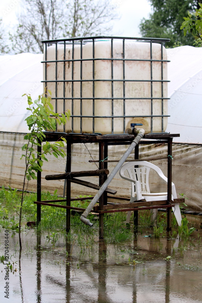 Caged Water Tanks