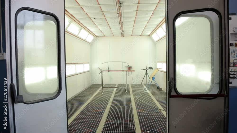 Wideo Stock: Car body and paint room. Spray paint cabinet in a car ...