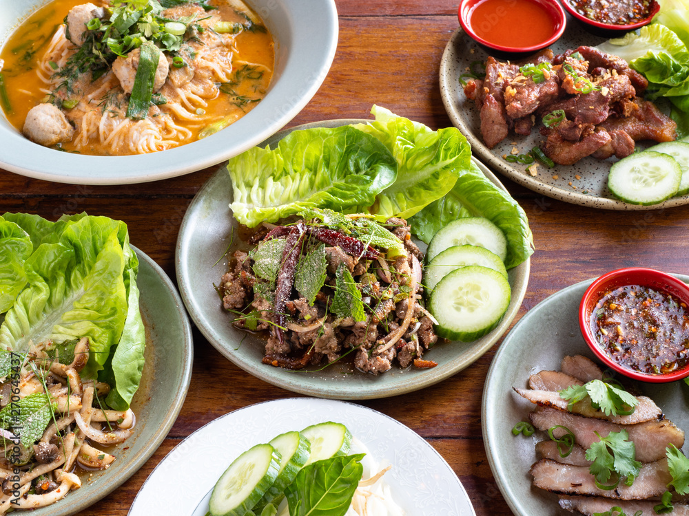 Traditional Northern Thai food cooked fresh. Pork laab, larb, mushrooms ...
