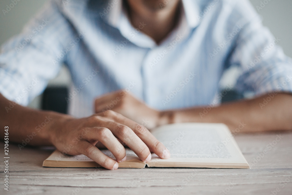 Reading a book Stock Photo | Adobe Stock