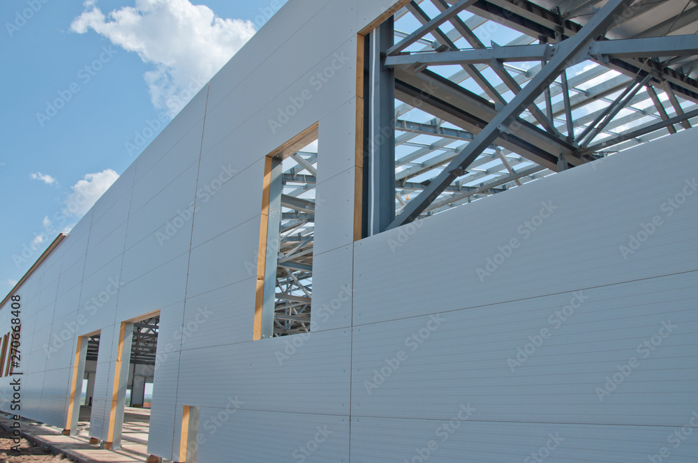 Sandwich panels at the construction site. Material for warming the ...