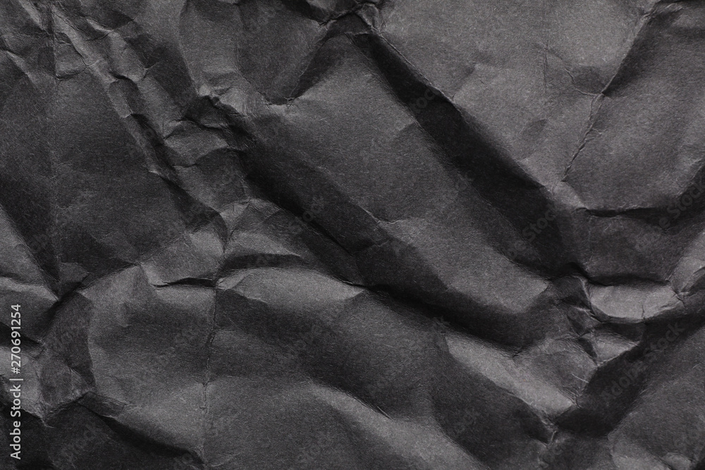 Sheet of black crumpled paper as background. Space for design Stock ...