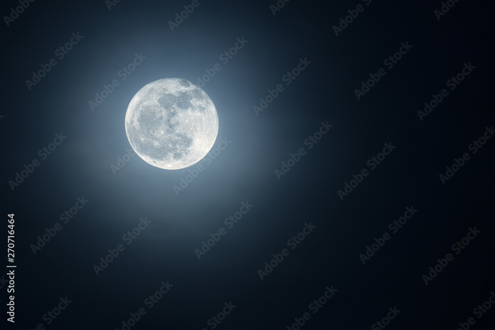 Beautiful moon in the night sky. Stock Photo | Adobe Stock