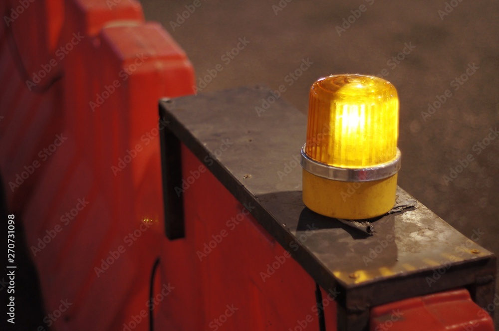 Yellow orange siren light rotary warning light in construction side ...