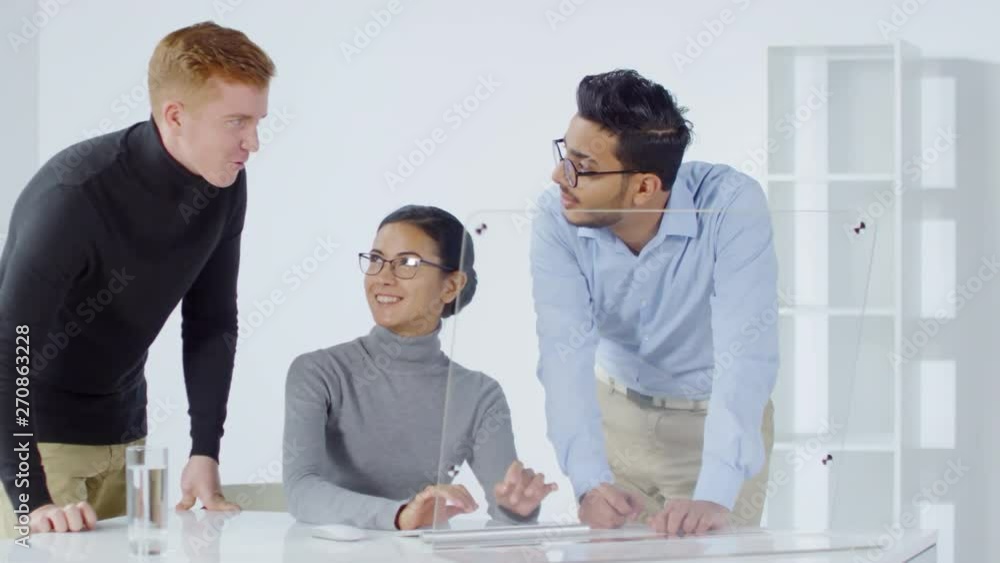 Lockdown of young Asian businesswoman sitting at invisible AR screen ...
