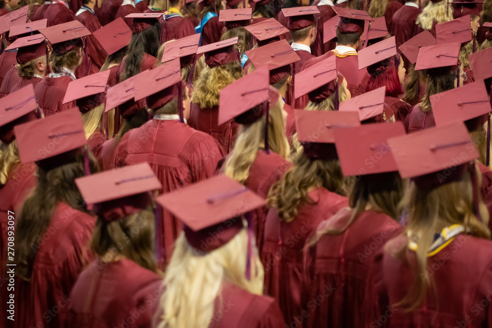 graduation caps and gowns Stock Photo | Adobe Stock