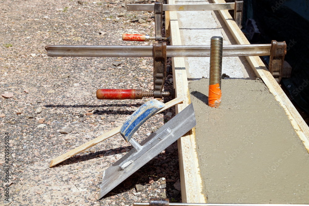 concrete foundation and form work. Clamp tool to join planks for a form ...