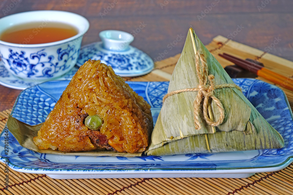 Sticky rice dumpling or Zongzi (Pyramid-shaped dumpling made by ...