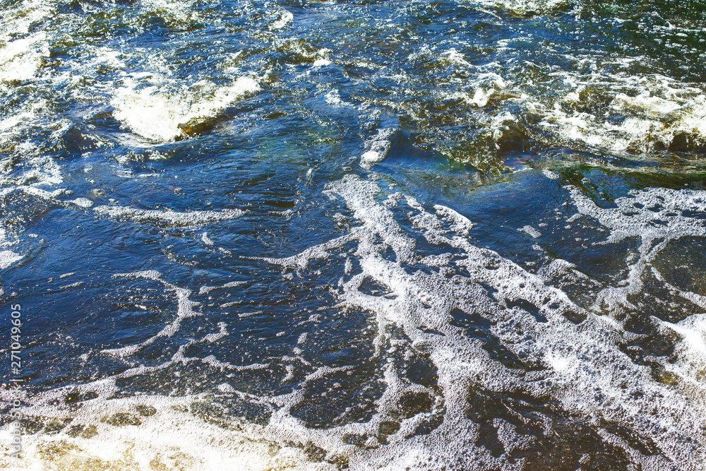 Water foam texture. Blue bubble spa washing background. Rough river ...