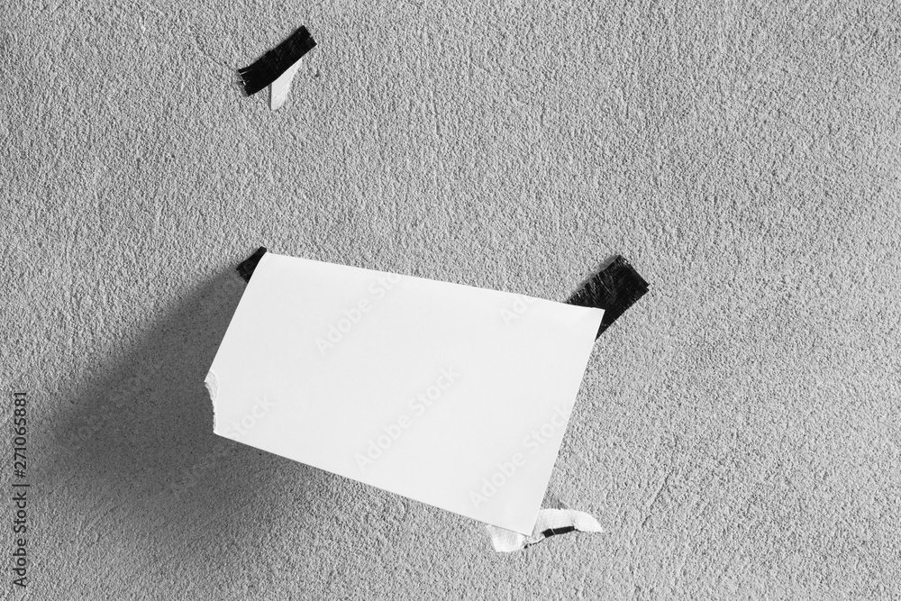 Blank portrait paper. brochure on gray cement wall, changeable ...