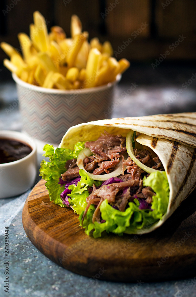 Wrap kebab with french fries Stock Photo | Adobe Stock