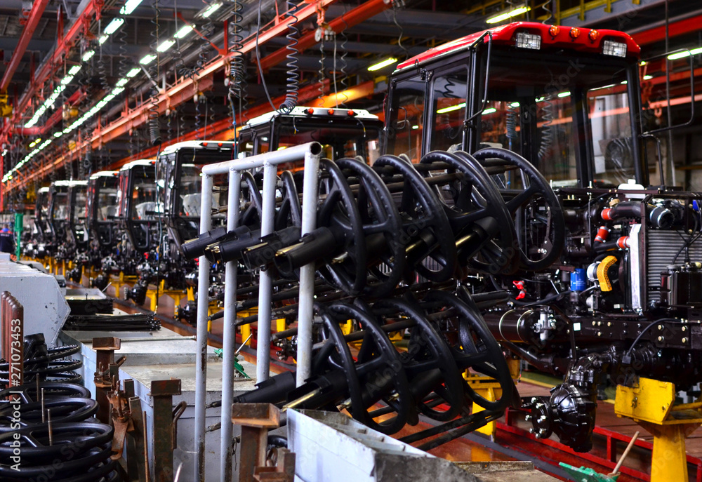Tractor Manufacture work. Assembly line inside the agricultural ...