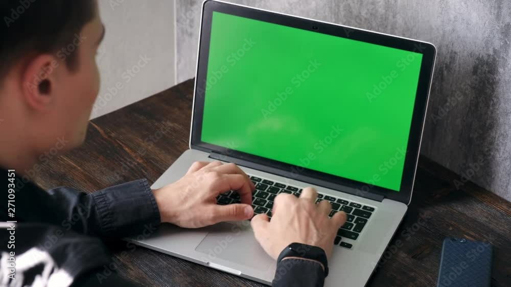 young programmer at work. businessman in the workplace. freelancer for ...