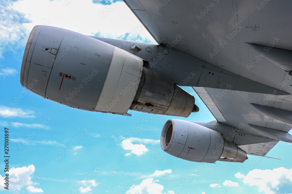 double Jet engine underneath the wing of a commercial airplane, Speyer ...