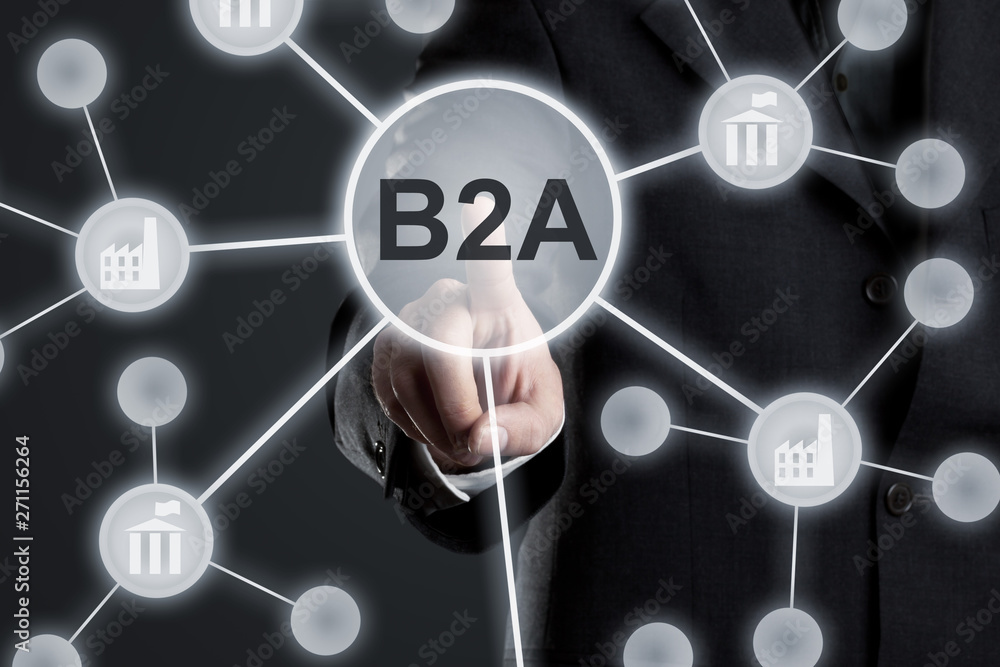 Executive businessman in suit touching B2A button in network with factory and administration ...