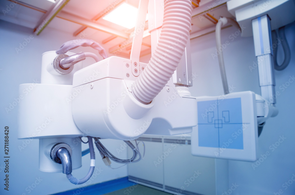 X-ray room in a hospital. Classic ceiling-mounted x-ray system. Stock ...
