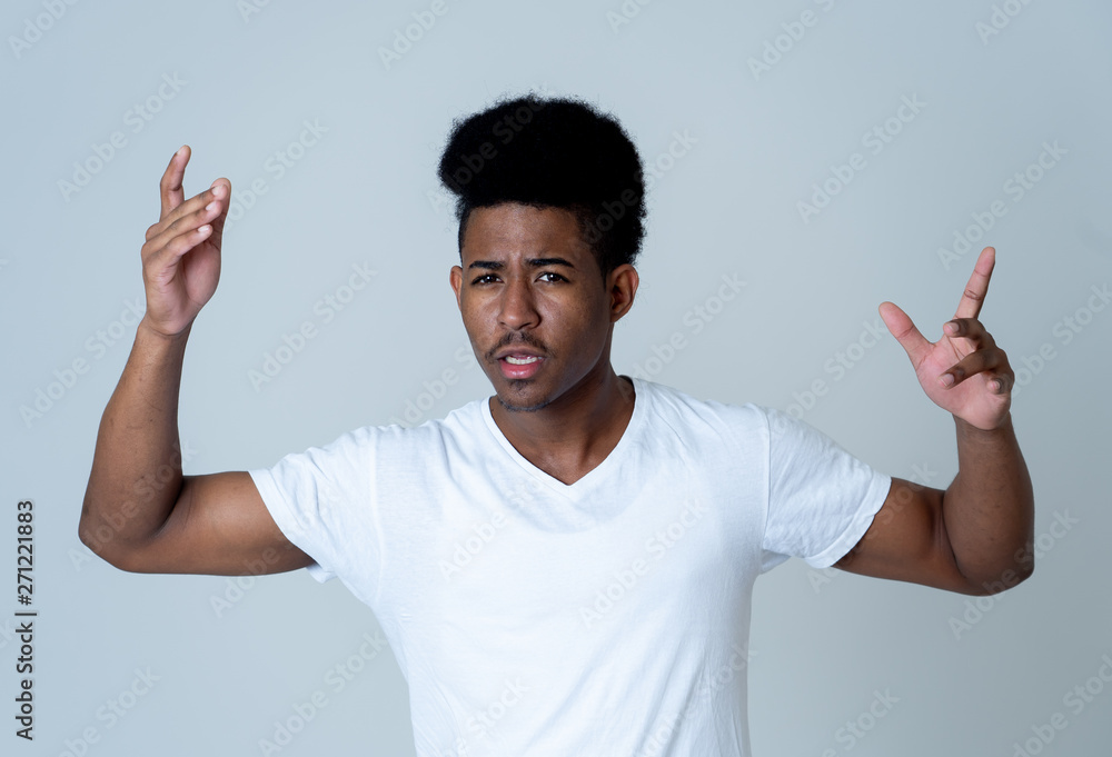 Human expressions and emotions. Young attractive man with an angry face ...