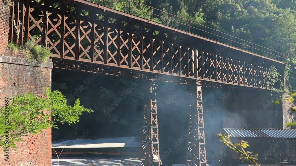 Iron bridge with reticular structure. The bridge was part of the ...