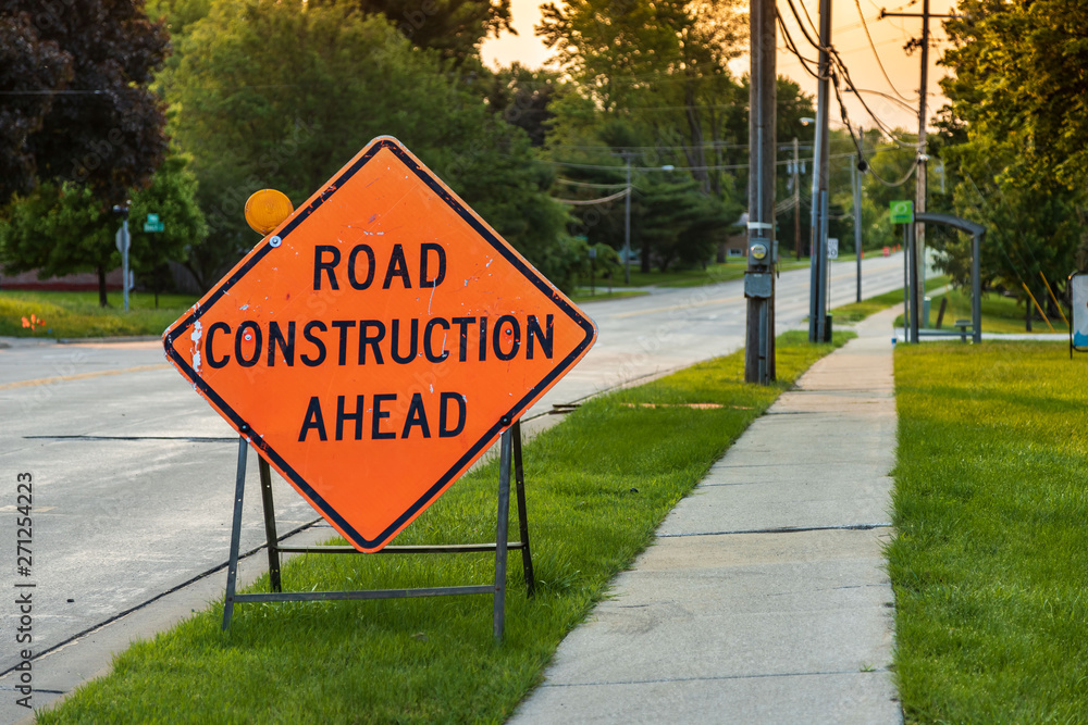 road construction sign by the road sign Stock Photo | Adobe Stock