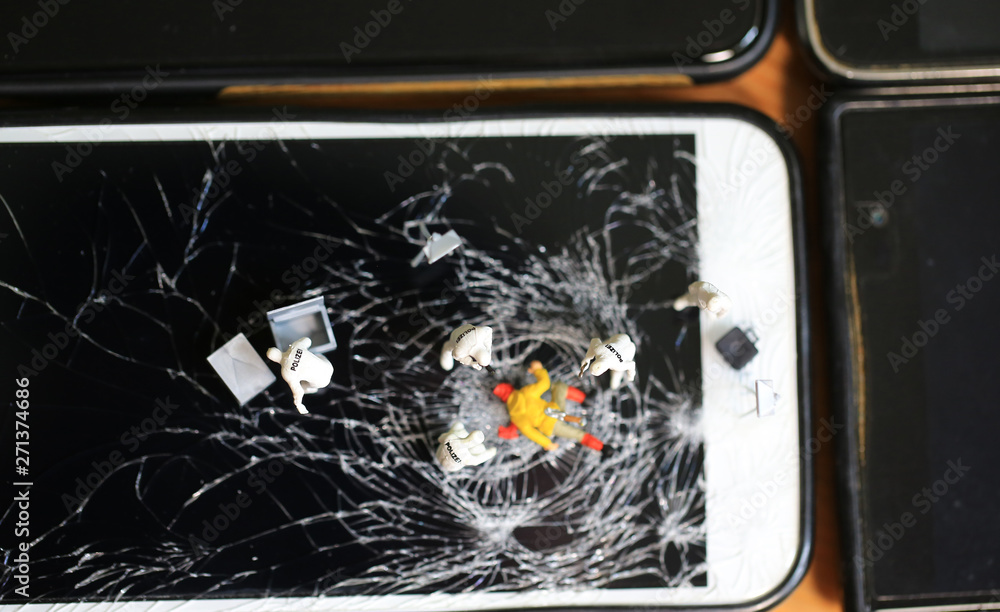 the accident of tiny man falling down on the screen of mobile Stock ...