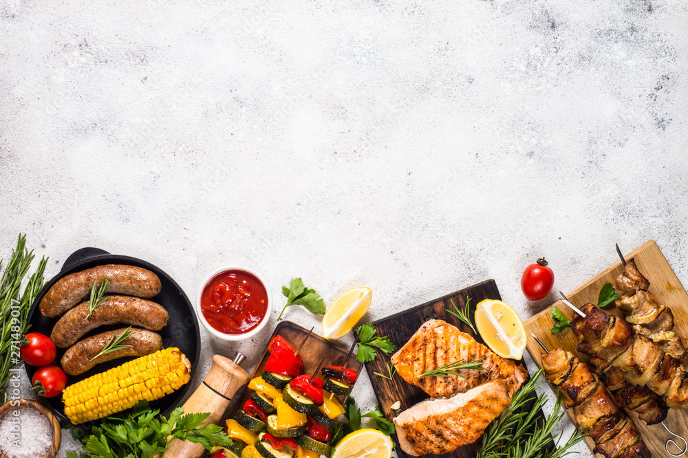 Barbeque dish - Grilled meat, fish, sausages and vegetables. Stock ...