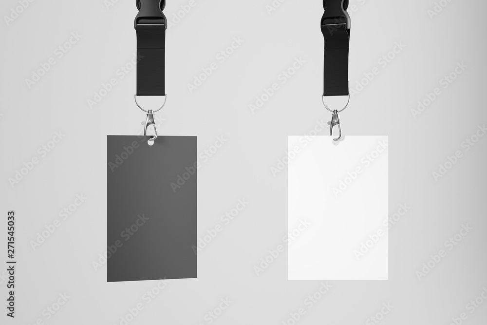 Black and white blank ID card hanging on ribbons on a white background ...