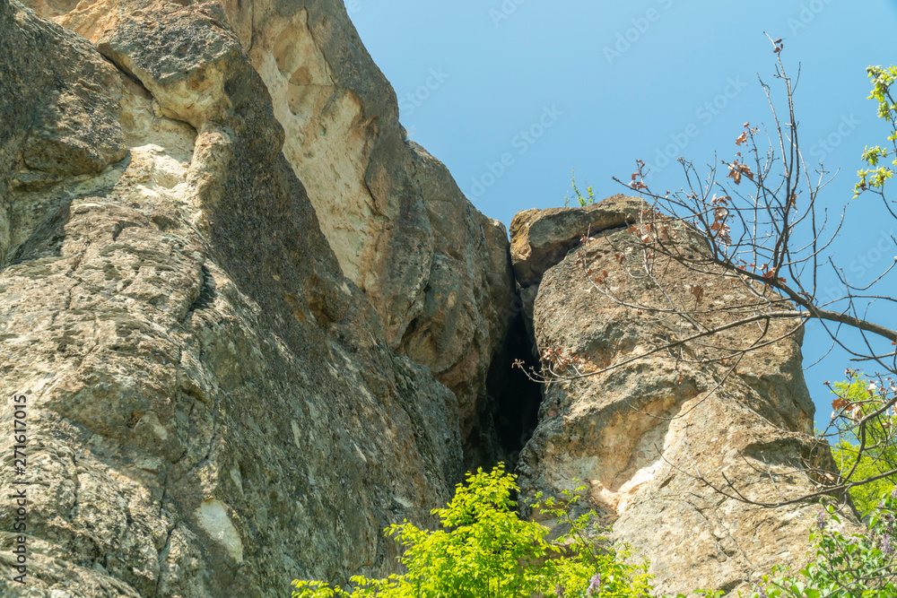 The entrance to the The womb cave also known as Utroba cave in Bulgaria ...