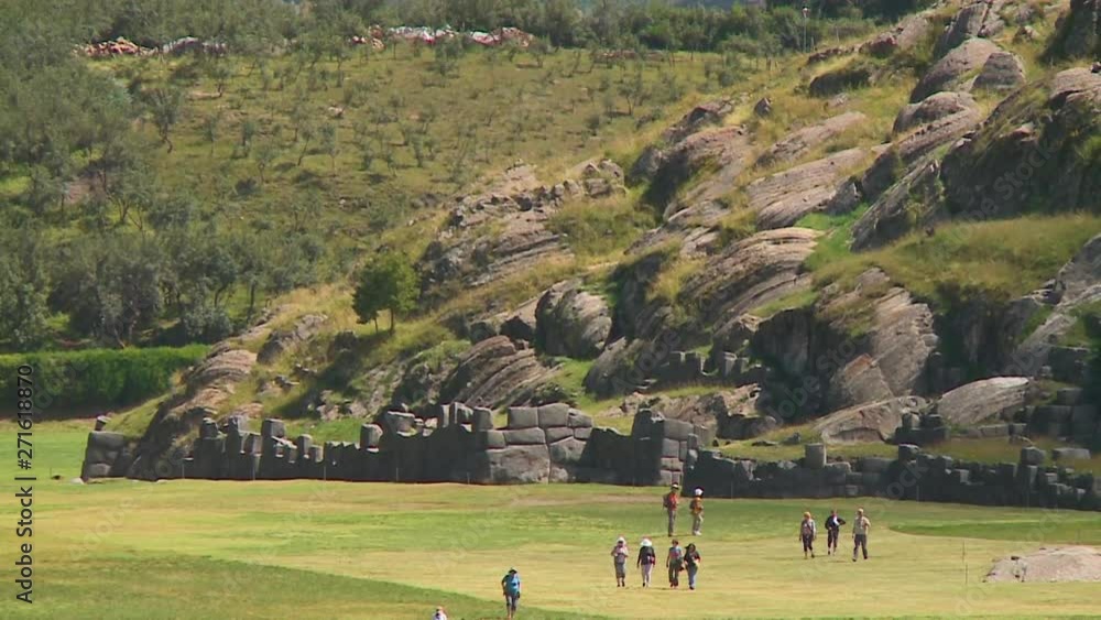 Medium high-angle still shot of megalithic stone walls at Sacsayhuaman ...