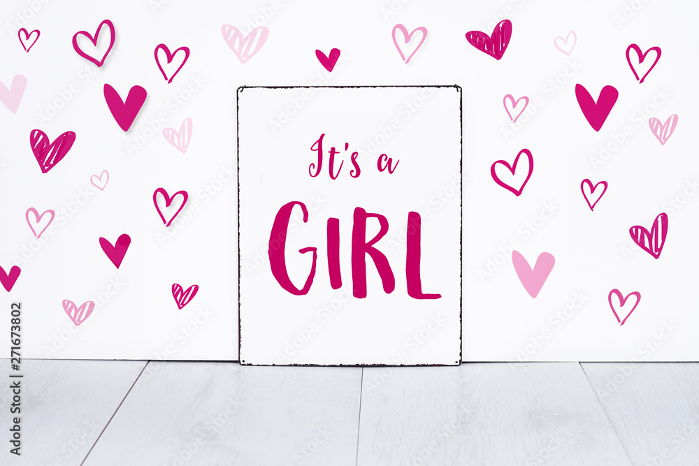 It's a girl new born baby text on sign board with cute little pink ...