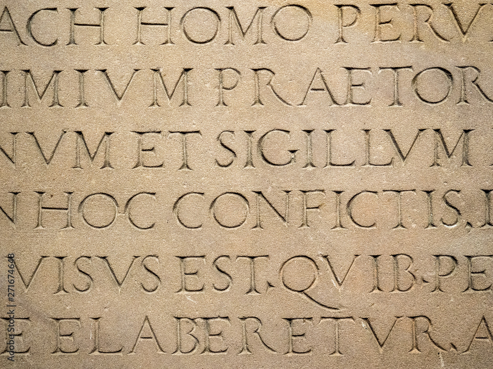 Old Latin text engraved on stone latin characters words Stock Photo ...