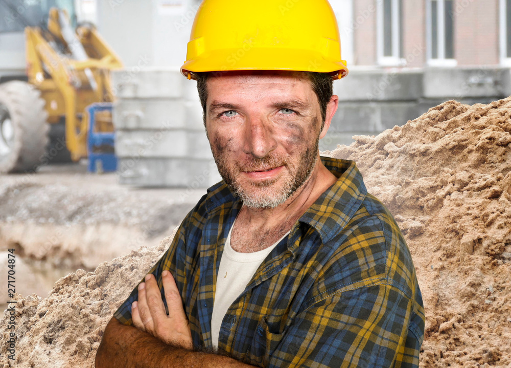 young attractive and confident contractor or construction worker man ...