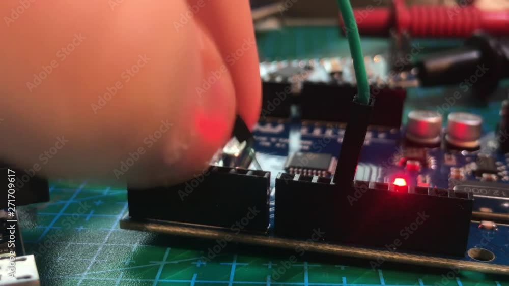 Inserting wires in to arduino pins on workbench while arduino led is ...