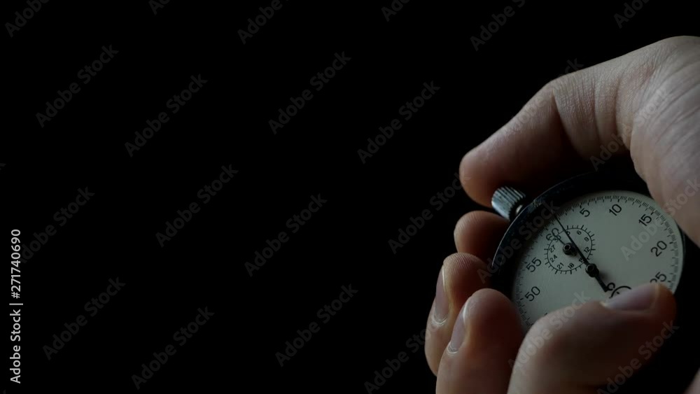 Analogue Stopwatch in Hand on the Black Background. Time Start with Old ...