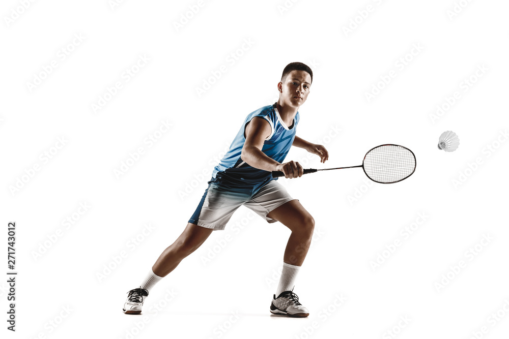Little boy playing badminton isolated on white studio background. Young ...