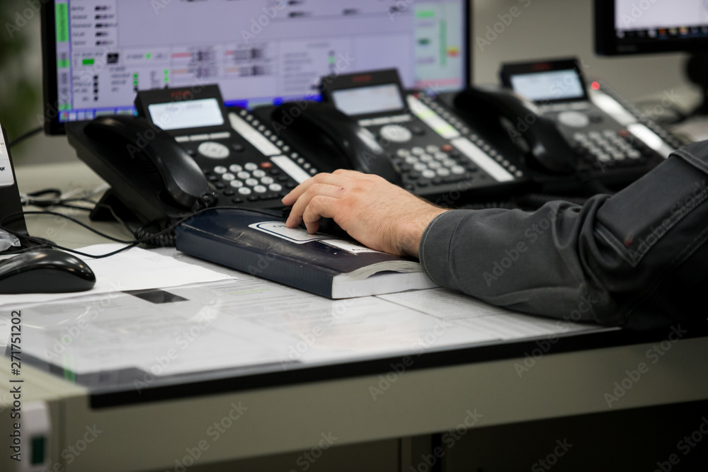 Engineering works with the tablet in the production control room ...