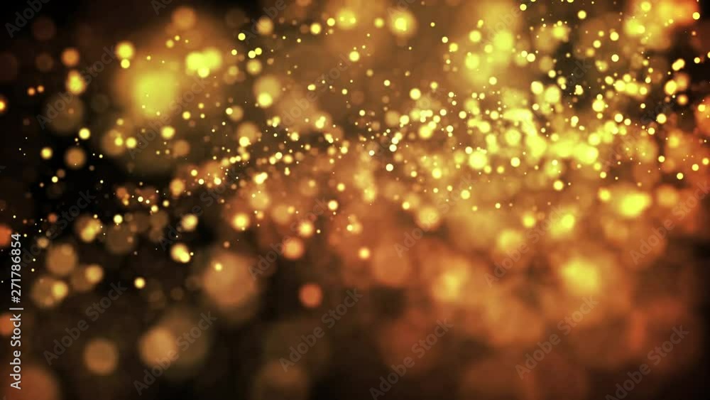 gold particles in liquid float and glisten. Background with glittering ...